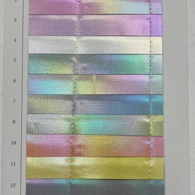 China Eco-Friendly Iridescent PU Artificial Leather Assorted Colors Embossed Pattern Stretchable for Bags Outdoor REACH RoHS Compliant for sale