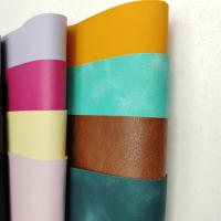 China Stocklot Bio-based PU Designer Leather Fabric Thermal Leather Fabric for Making Notebook and Trademark for sale