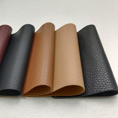 China Hot Sale Fashionable Litchi Pattern Soft Decorated PU Synthetic Leather for Shoe Upper and Garments for sale