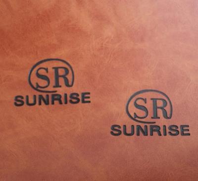 China Custom Logo 1.0mm Hot Stamp Printed PU Synthetic Labels Leather Patch Fabric for Phone Case Notebook Cover Handbags Jeans for sale