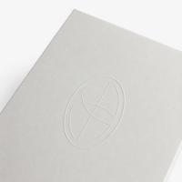 China Magnetic Flip Top Gift Boxes with Embossed Logo Flocking Insert Jewelry Cosmetic Packaging for sale