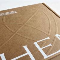 China Custom Kraft Corrugated Mailer Boxes with White Foil Stamping Embossed Logo for sale