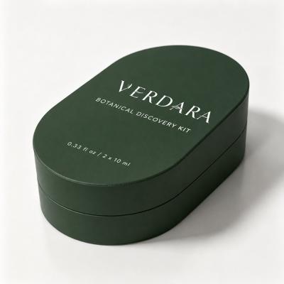 China Perfume Packaging Custom Rigid Boxes Oval Shaped with EVA Insert for sale