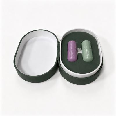 China Oval Flip Perfume Packaging Boxes Spot UV Finished with Customized Insert for sale