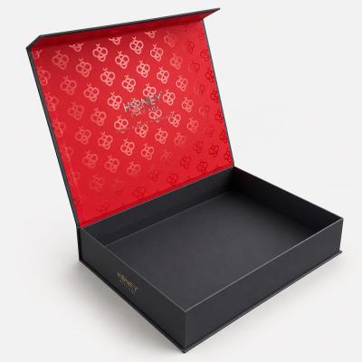 China EVA Insert Black Magnetic Gift Boxes Gold Foil Stamping UV Finished for sale