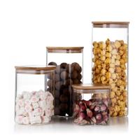 China 300ml Cylinder Glass Storage Containers with Airtight Bamboo Lids 560℃ for sale