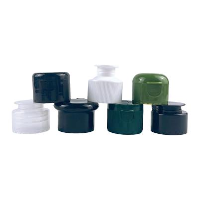 China 24/410 Disc Plastic Flip Top Lid for Lotion Bottles 24mm Shampoo Cap 0.08cc for sale