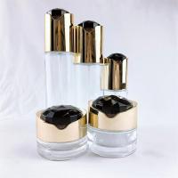 China Clear Luxury Skincare Glass Bottle Set 20ml to 100ml Custom Cosmetic Packaging for sale