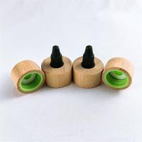 China 24/410 28/410 Disc Top Caps with Bamboo Collar for Lotion Cosmetics 0.08cc 0.2cc for sale