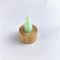 China 24/410 28/410 Disc Top Caps with Bamboo Collar for Lotion Cosmetics 0.08cc 0.2cc for sale