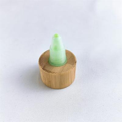 China 24/410 28/410 Disc Top Caps with Bamboo Collar for Lotion Cosmetics 0.08cc 0.2cc for sale