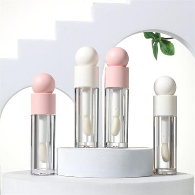China Empty 5ml Plastic Lip Balm Tube Round Crown Cosmetic Container Customizable for sale