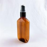 China 20ml Boston Round Glass Bottle with Treatment Pump Clear Amber Empty Essential Oil Bottle for sale