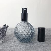 China 100ml pineapple shape glass spray bottle perfume glass empty bottle for sale