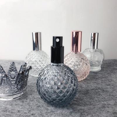 China 100ml pineapple shape glass spray bottle perfume glass empty bottle for sale