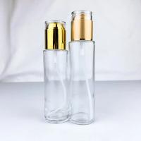 China round empty glass cosmetic liquid foundation serum lotion bottle with pump for sale