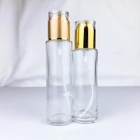 China round empty glass cosmetic liquid foundation serum lotion bottle with pump for sale