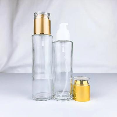China Gold Glass Set Packaging Skin Care Lotion Bottle Face Cream Jars 20ml to 120ml for sale