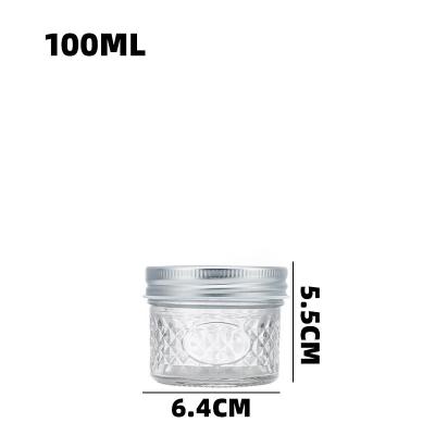 China Embossed Clear Glass Storage Jar with Screw Cap 30ml to 1000ml for Coffee Bean Peanut Oatmeal for sale