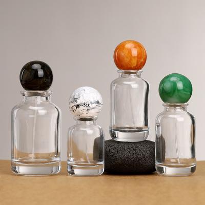 China 30ml 50ml 100ml Pressed Transparent 15 Bayonet Glass Perfume Bottle for Cosmetic Packaging for sale