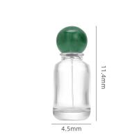 China Luxury Round Glass Perfume Bottle 50ml with Marble Lid and Mountain Bottom Design for sale