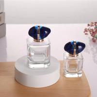 China 50ml 100ml Selling Clear Glass Perfume Bottle With Customized Lid for sale
