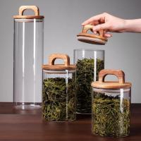 China High Borosilicate Glass Food Storage Jar 700ml 2150ml with Wooden Handle Lid Reusable for sale