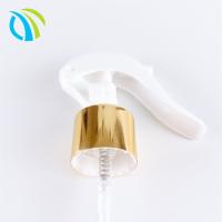 China 0.12cc 24/410 Trigger Bottle Spray 28mm Spray Trigger Smooth Ribber Closure for sale