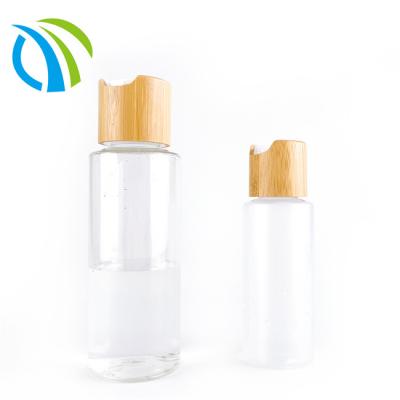 China 24/410 Natural Bamboo Disc Top Cap 0.1ml Flip Top Wooden Bottle Cap for Soap Dispenser for sale