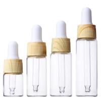 China Empty 20ml Amber Glass Dropper Bottles with 18/415 Smooth Closure for Essential Oils for sale