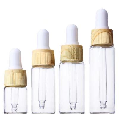 China Empty 20ml Amber Glass Dropper Bottles with 18/415 Smooth Closure for Essential Oils for sale