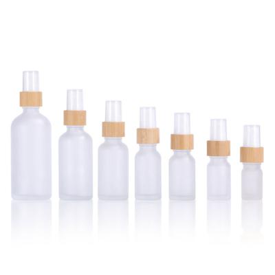China 50ml White Bamboo Lid Cosmetic Jar 24/410 Fine Mist Sprayer Pump for sale