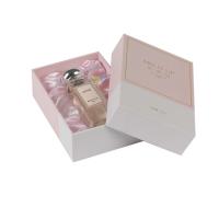 China Custom Pink Perfume Bottle Box Packaging 132x95x45mm with Silk Filling Sustainable Book Shape for sale