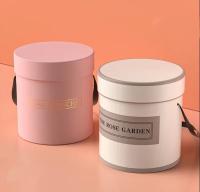 China Custom Luxury Round Flower Packaging Box with Ribbon Handle - 157gsm Paper & 1200gsm Cardboard Construction for sale