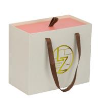 China Eco Friendly Rigid Cardboard Sliding Drawer Gift Boxes With Ribbon Handle for sale