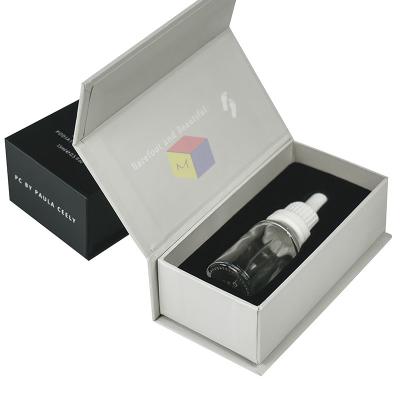 China Single Magnetic Closure Essential Oil Packaging Boxes Rigid Cardboard With Foam Insert for sale