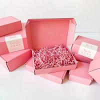 China Custom Logo Cardboard Shipping Mailer Box Pink Cosmetics Mailing Packaging with Raffias for sale