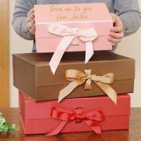 China Magnetic Folding Box Shape Rigid Cardboard Gift Packaging with Ribbon Closure for sale