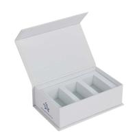 China Luxury White Magnetic Rigid Cardboard Cosmetic Bottle Essential Oil Packaging Boxes with Foam Insert for sale