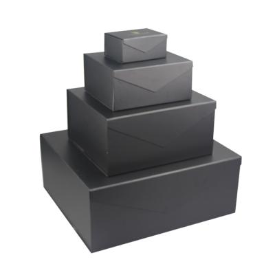 China Luxury Matte Black Magnetic Folding Box with Hot Foil Logo Custom Apparel Clothing Packaging for sale