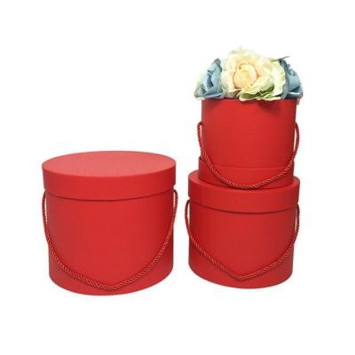 China Custom Round Cylinder Flower Box Packaging with Handle - 100% Eco-Friendly Materials & 10-Day Production for sale