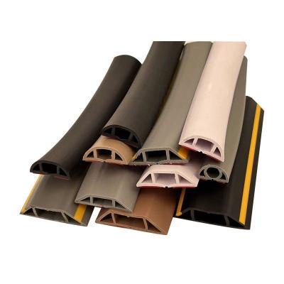 China Brown Architecture PE Profile Customization PVC Cable Trunking Plastic Profiles for sale