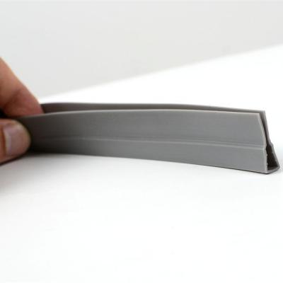 China Soundproof Plastic Cover Strip Door Bottom Garage Door Weather Seal Black Profile Customized for sale