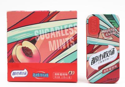 China 22g Colorful Metal Case Cooling Peach Flavor Sugar Free Mint Candy Rich In Vitamin C for sale