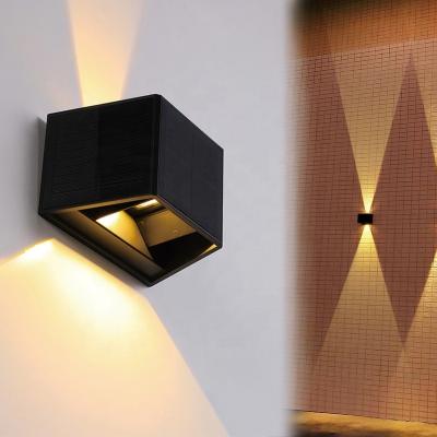 China Dusk to Dawn 3.7V 1300mAh Wall Mounted Solar Light Up And Down  outdoor lamp for sale
