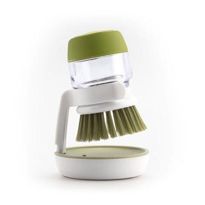China Kitchen Cleaning Palm Brush with Soap Dispenser 190g 12x9x7.5cm Dish Washing Brush for sale