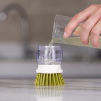 China Kitchen Cleaning Palm Brush with Soap Dispenser 190g 12x9x7.5cm Dish Washing Brush for sale