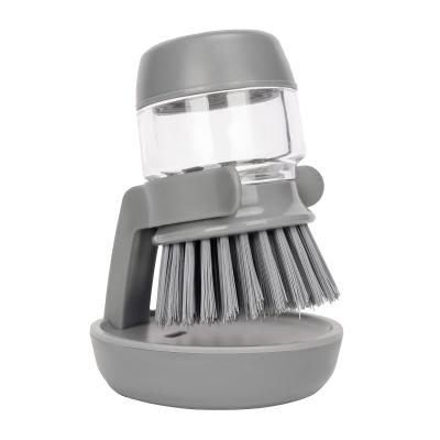 China Soap Dispensing Dish Washing Brush 5x5x10 cm with Drip Tray Kitchen Scrub Brush for sale