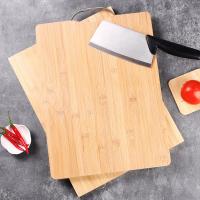 China Simple Natural Custom Bamboo Cutting Board With Iron Handle for sale