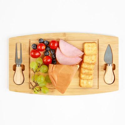China Natural Bamboo Cutting Board 17.7x13.3x2.4 Inch Wood Serving Tray for Cheese Pizza for sale